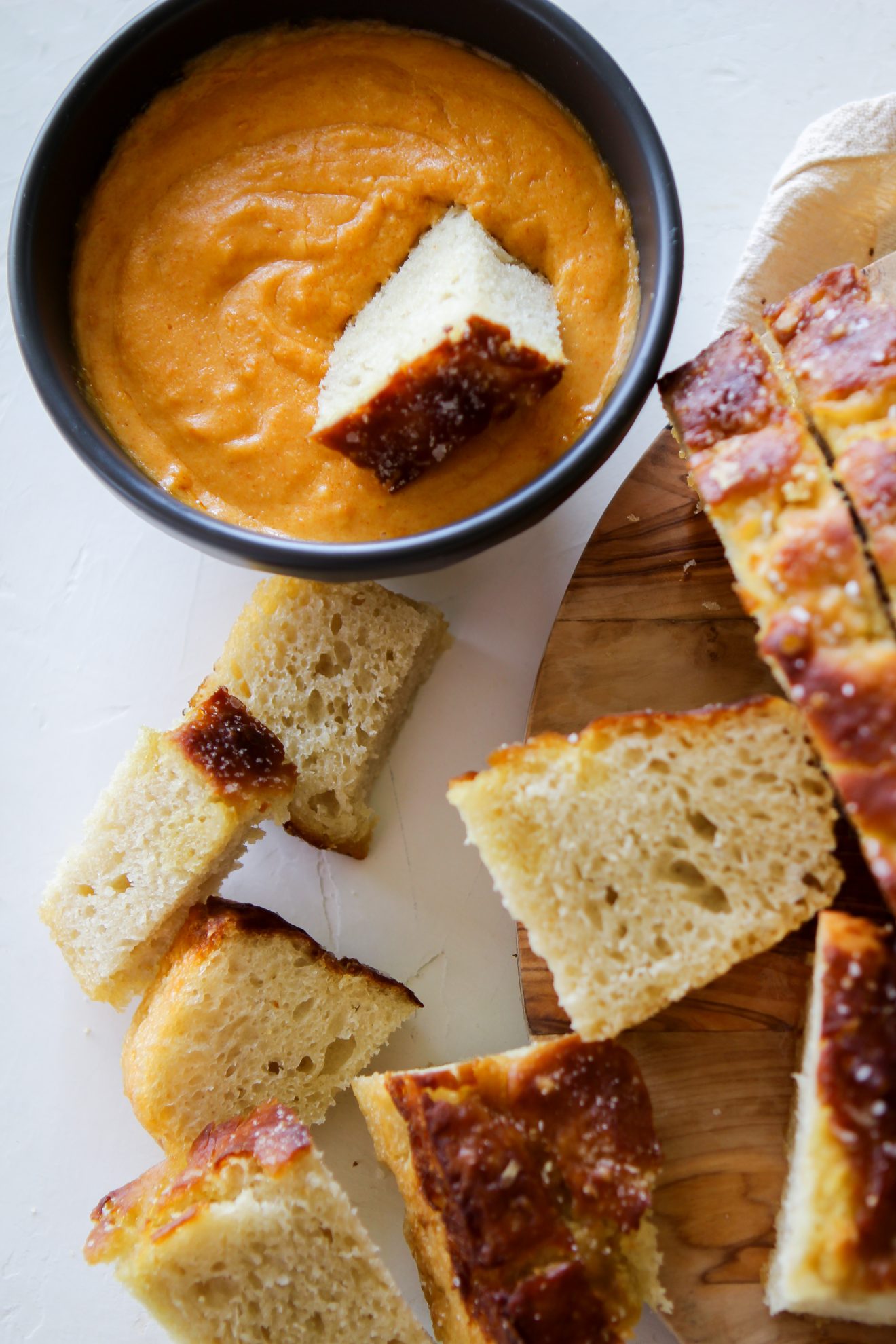 Pretzel Focaccia Bread with Spiced Cheese Dipping Sauce - Mozie