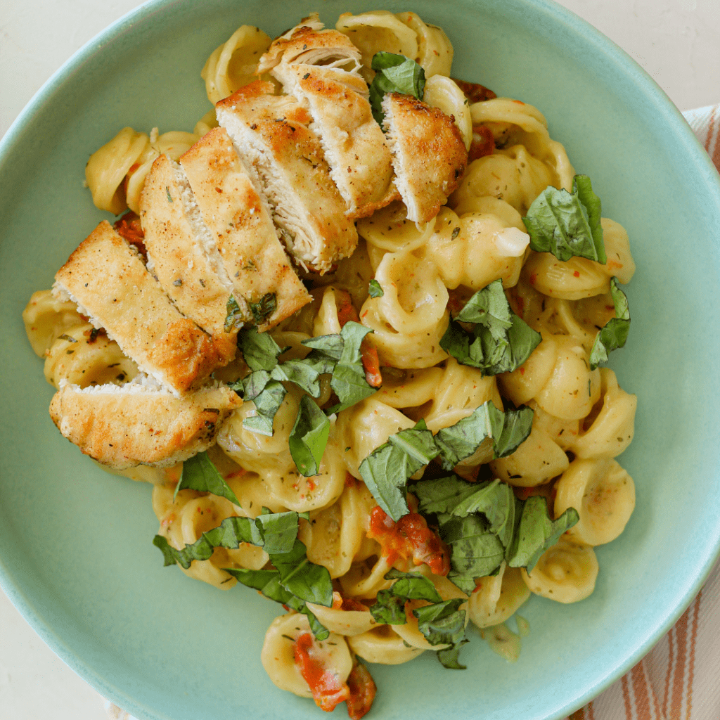 Creamy Tuscan Pasta with Herby Breaded Chicken - Mozie